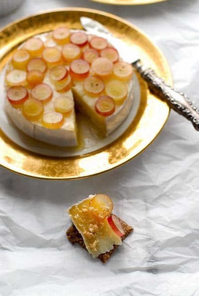 Baked Brie with Pink Champagne Jelly, Red Grapes and Marcona Almonds